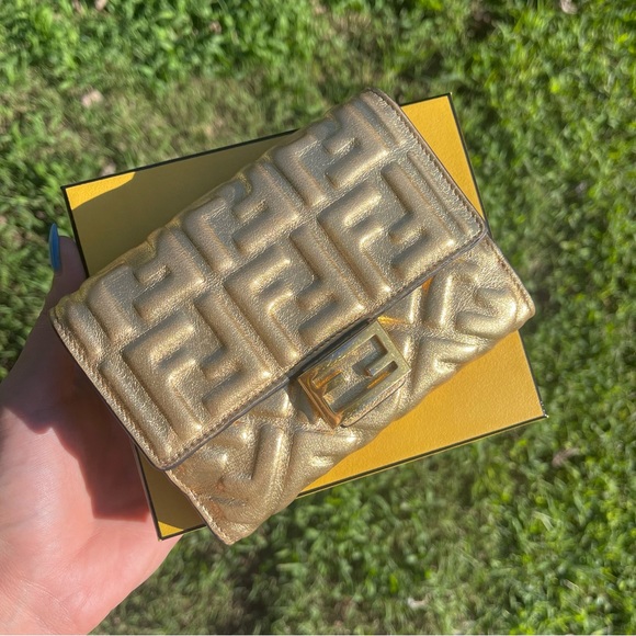 Fendi | Bags | Fendi Gold Leather Ff Embossed Large Compact Wallet ...